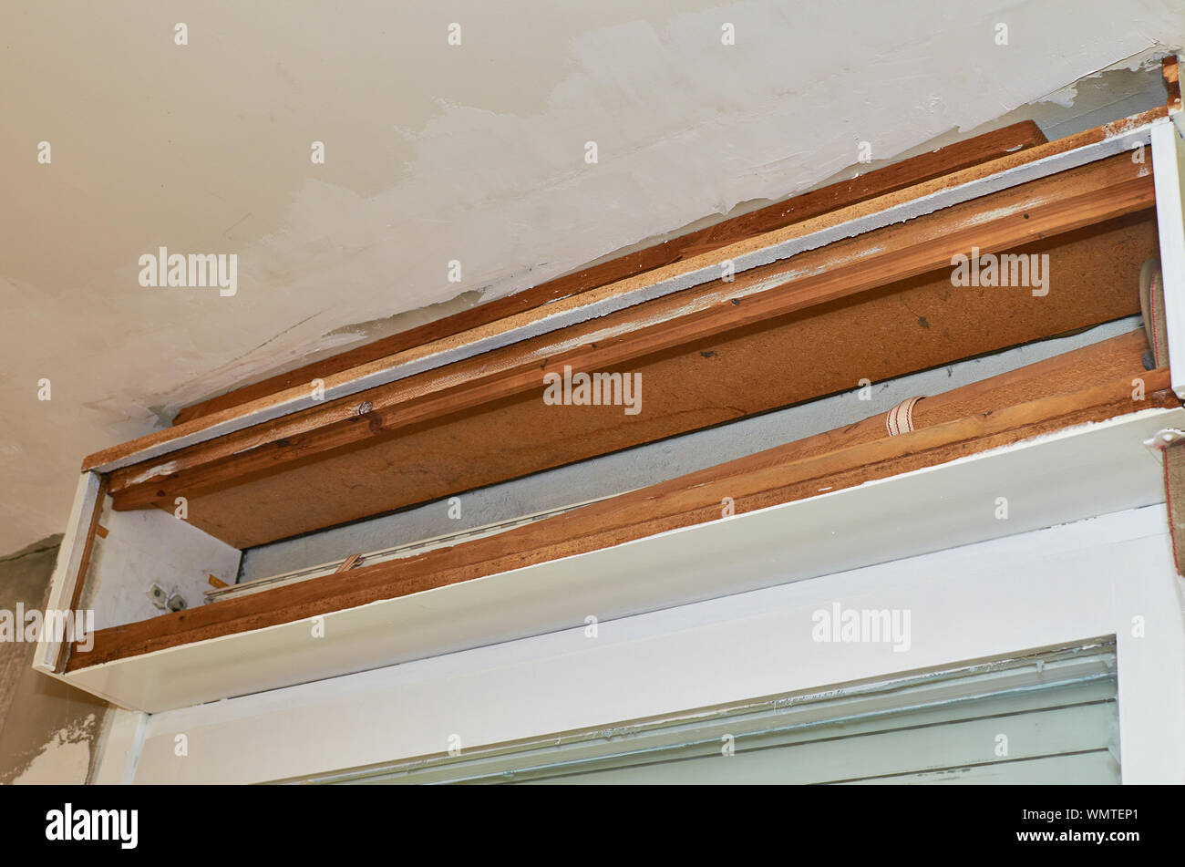 Open wooden box of a blind with a part of blind in it Stock Photo - Alamy