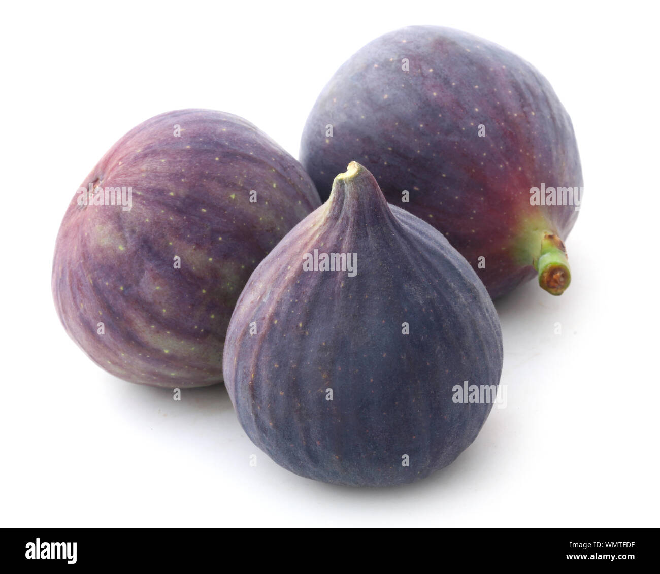 Three Figs Isolated On White Stock Photo - Alamy