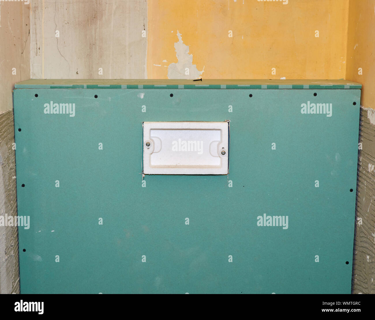 Box made from plaster boards with toilet flush system inside it Stock ...