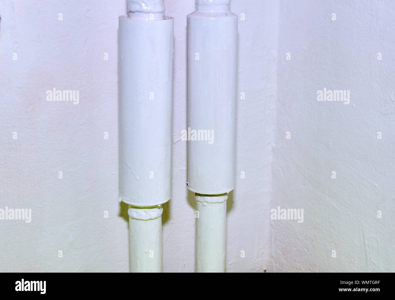 Heating pipes fresh colored in white during renovation works in an ...