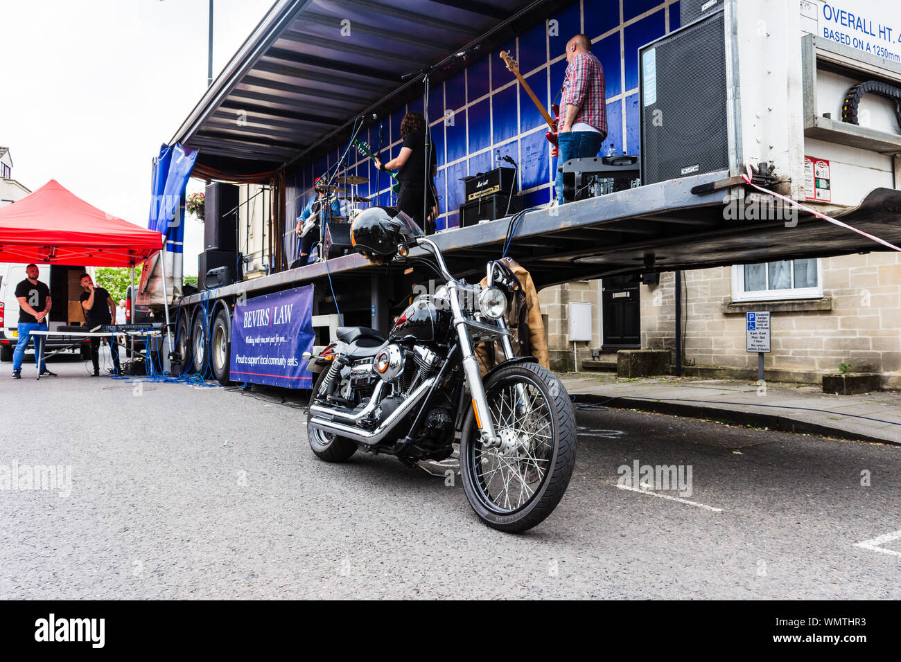 The mobile music stage at Calne Bike meet, with a band warming up and a ...