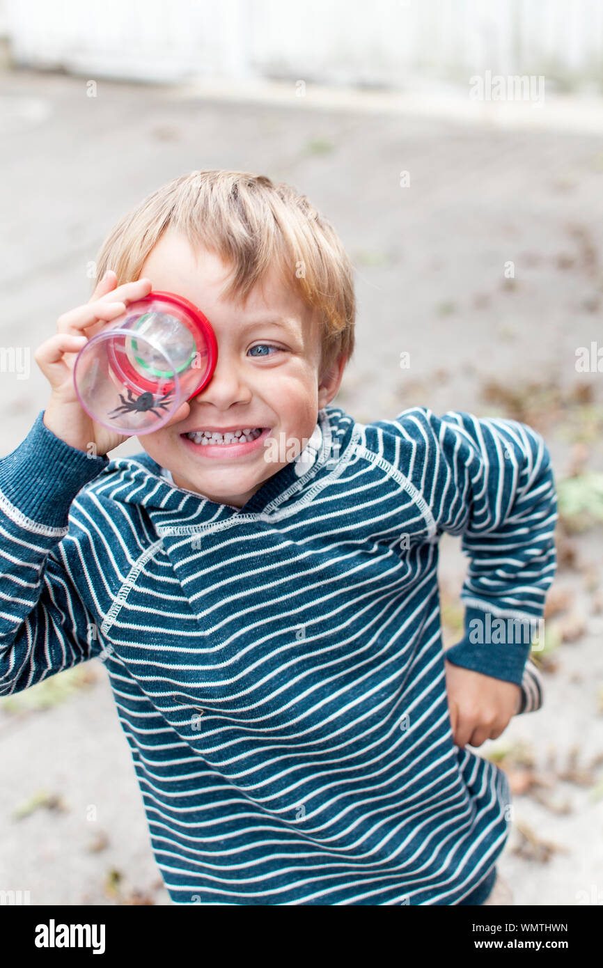 Standing holding toy childhood smiling hi-res stock photography and ...