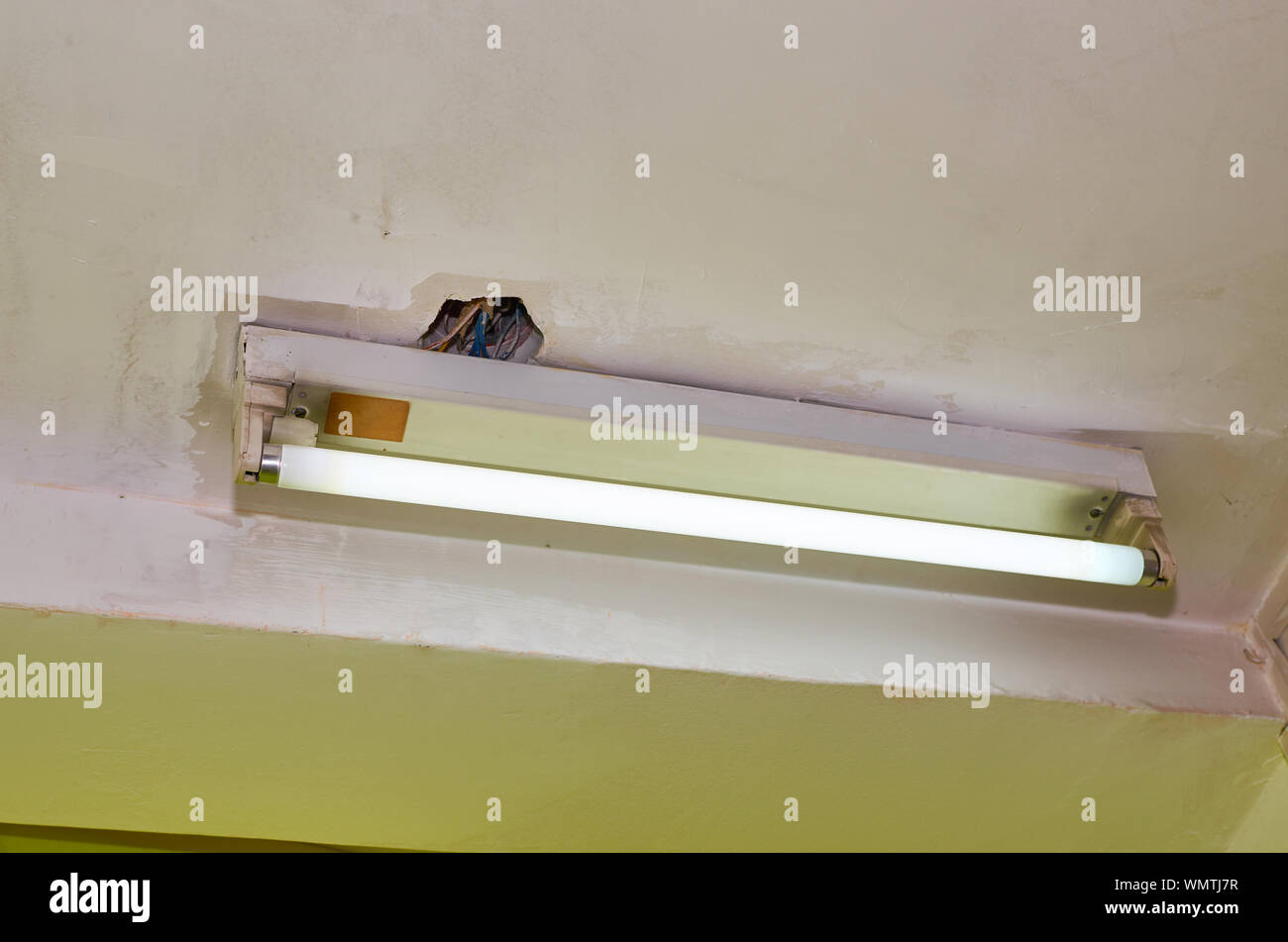 Old neon ceiling lamp with its electric installation Stock Photo - Alamy