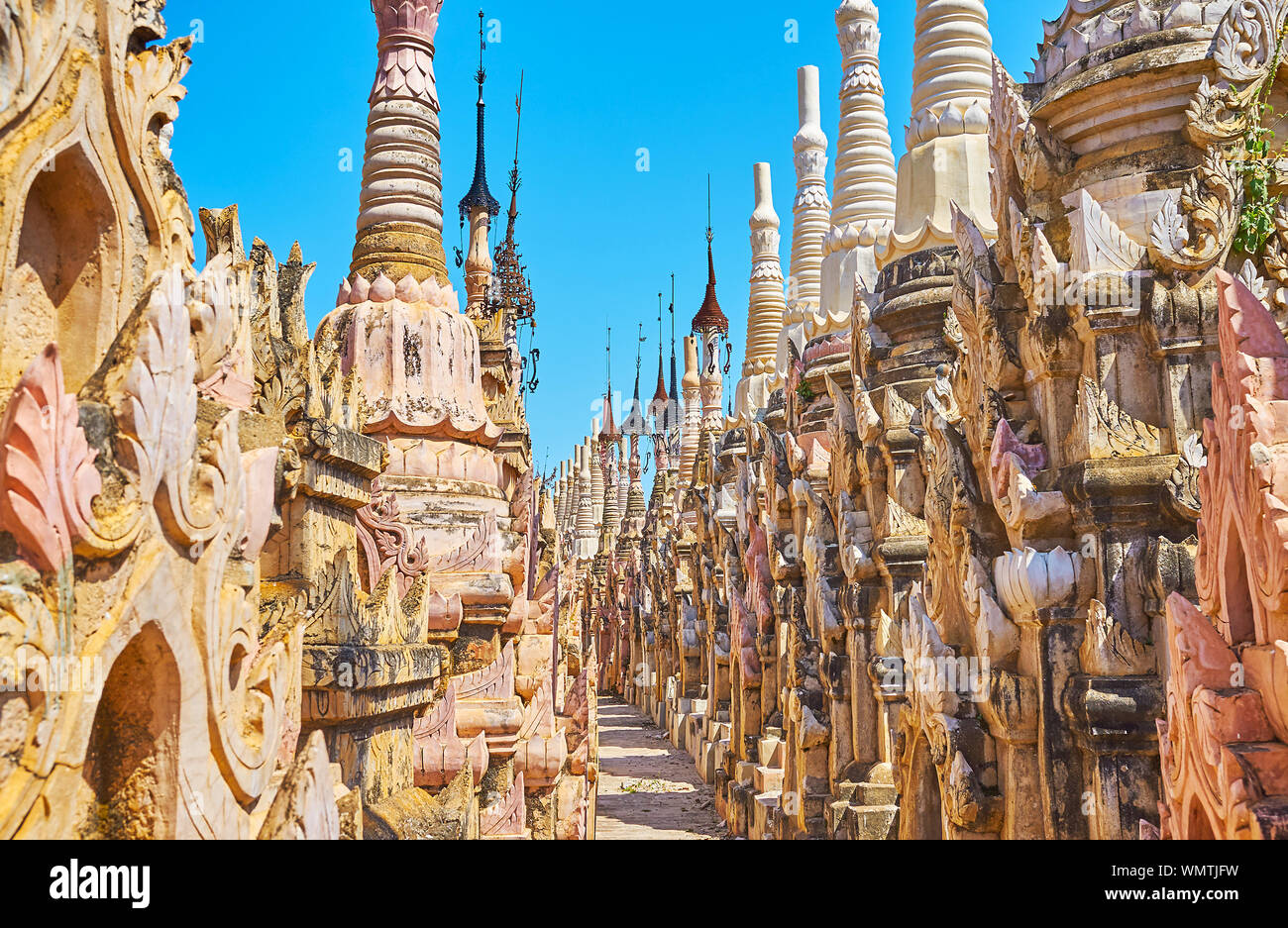 The dense row of burial stupas, richly decorated with relief stucco ...