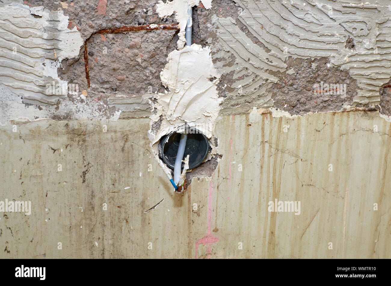 New electric installation in a wall for a socket outlet during ...