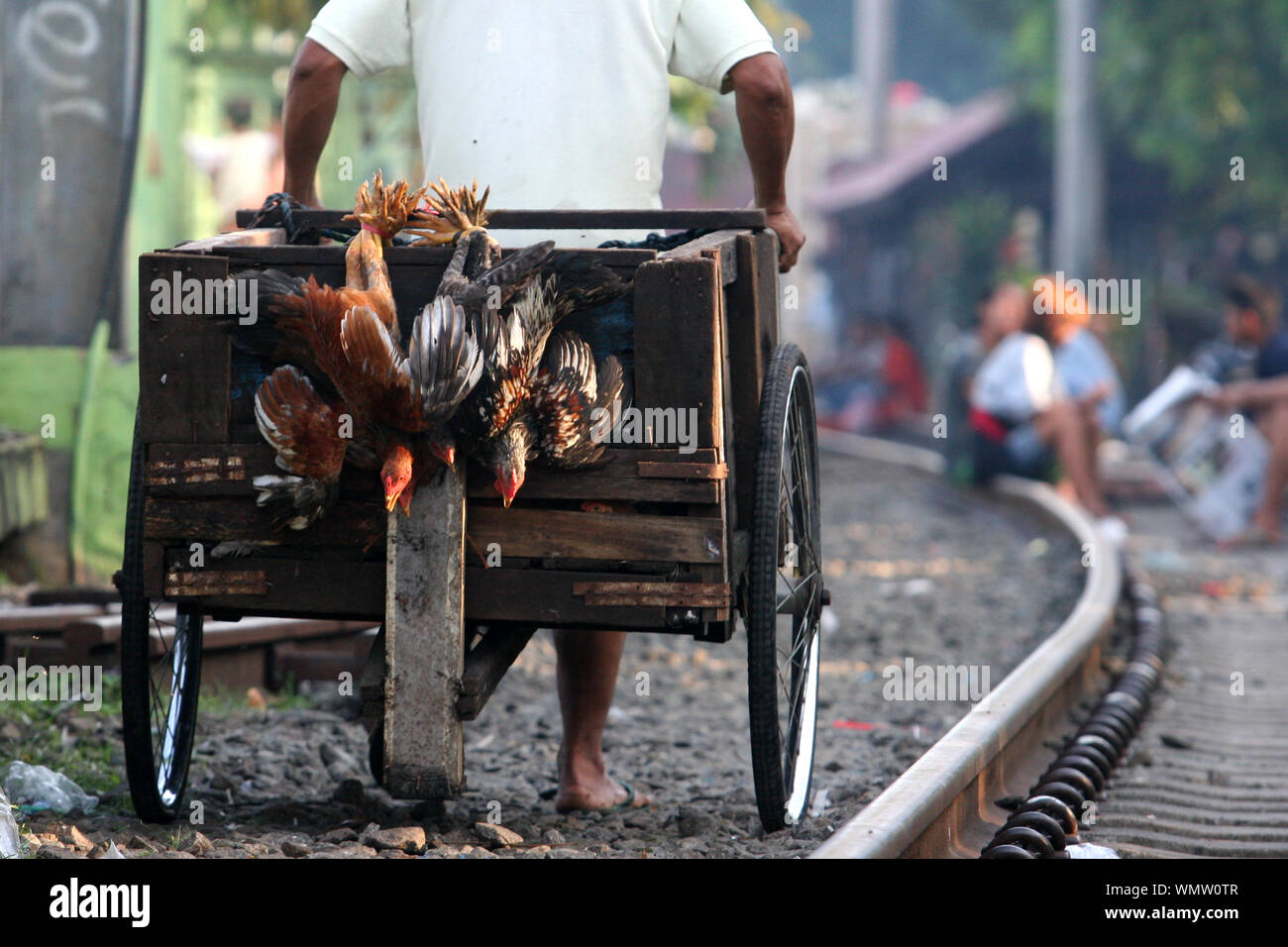 Man pulling cart hi-res stock photography and images - Alamy