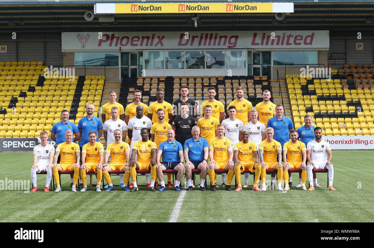 Players and staff pose for a team photograph Stock Photo - Alamy