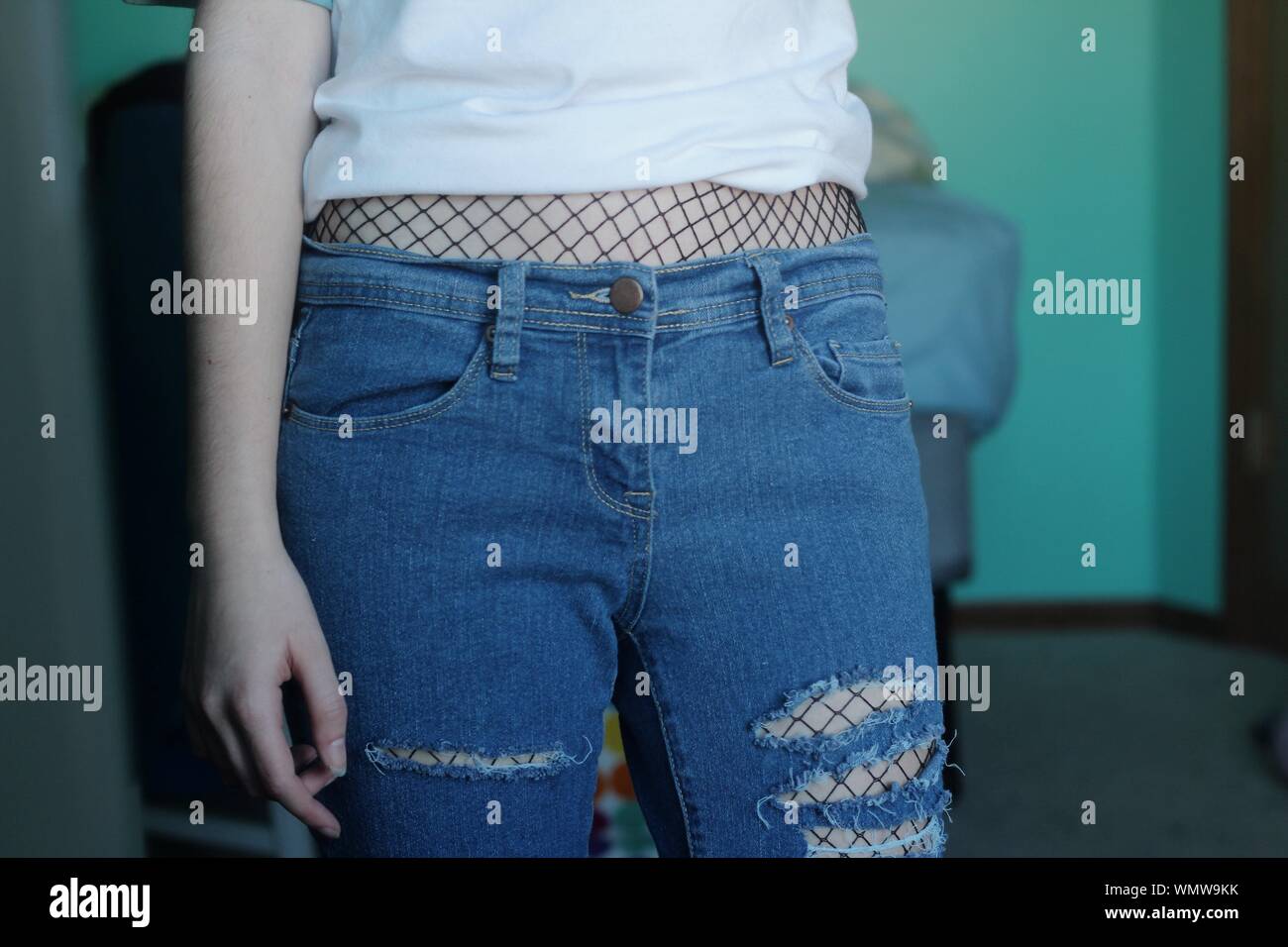 Torn fishnet stockings hi-res stock photography and images - Alamy