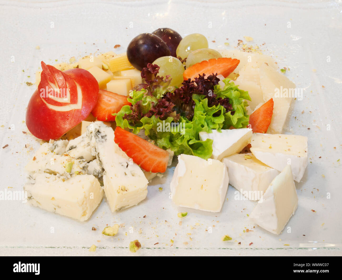 Selection of cheeses with nuts and fruit Stock Photo - Alamy