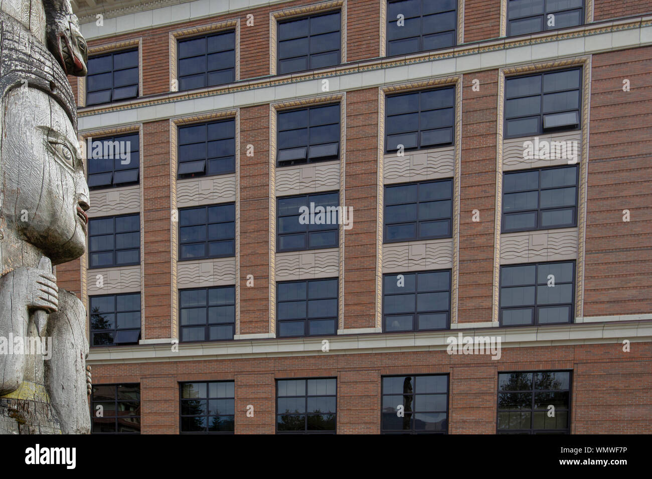 Alaska State Capital building in Juneau Alaska with a totem pole of the ...