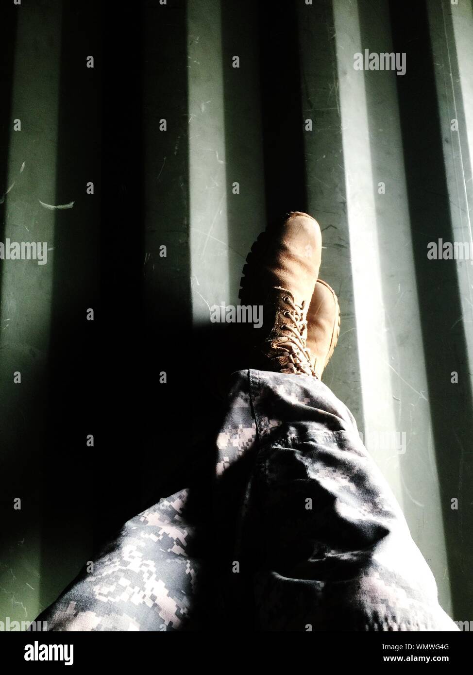 Legs up on wall hi-res stock photography and images - Alamy