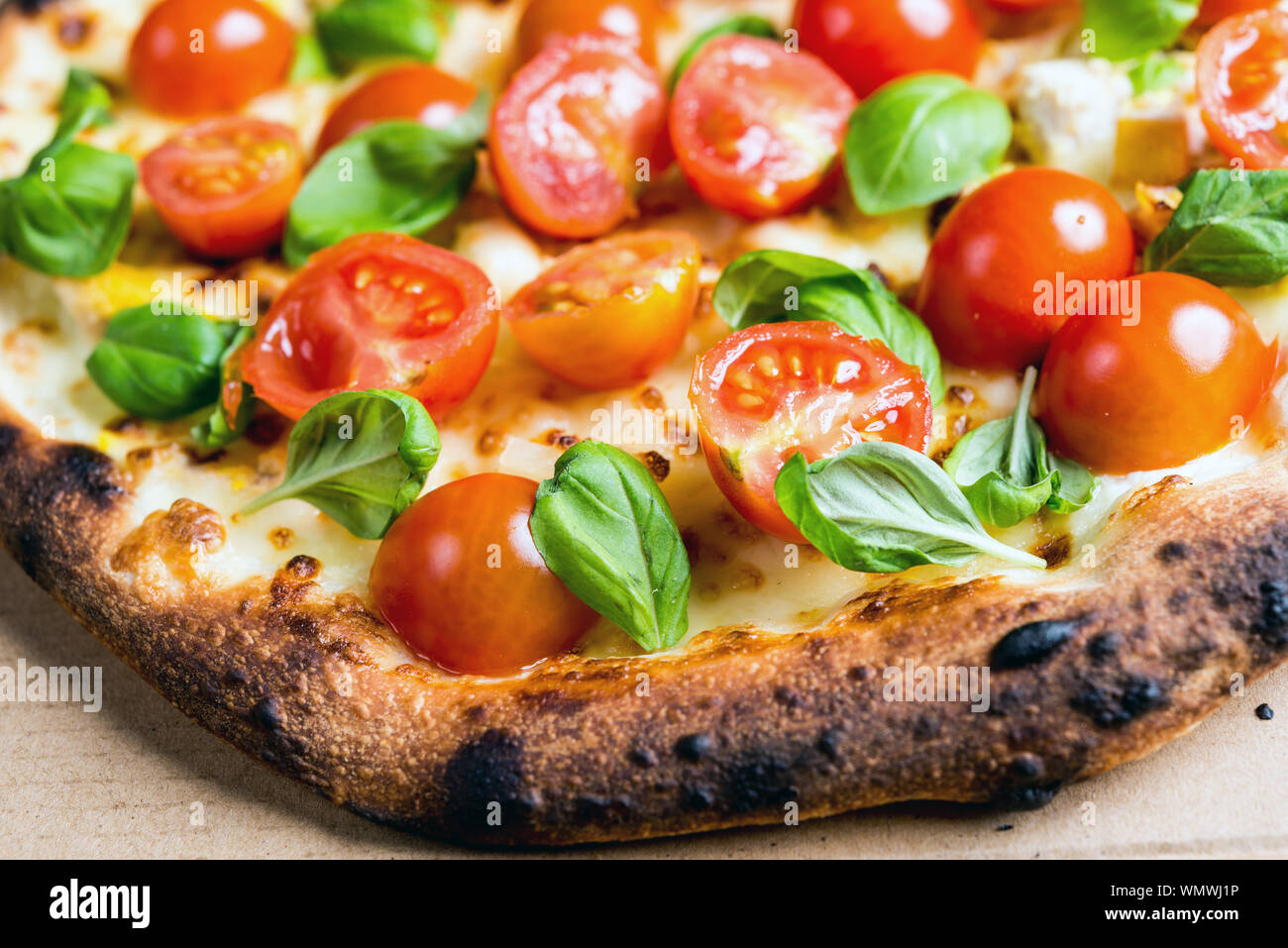 Basil leaves on pizza hi-res stock photography and images - Alamy