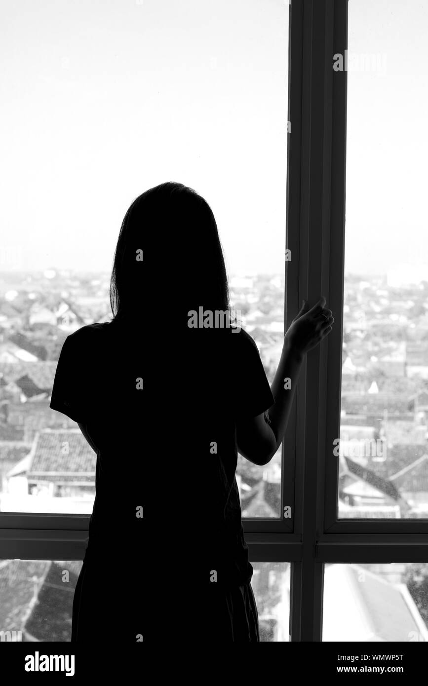 Woman silhouette window rear Black and White Stock Photos & Images - Alamy