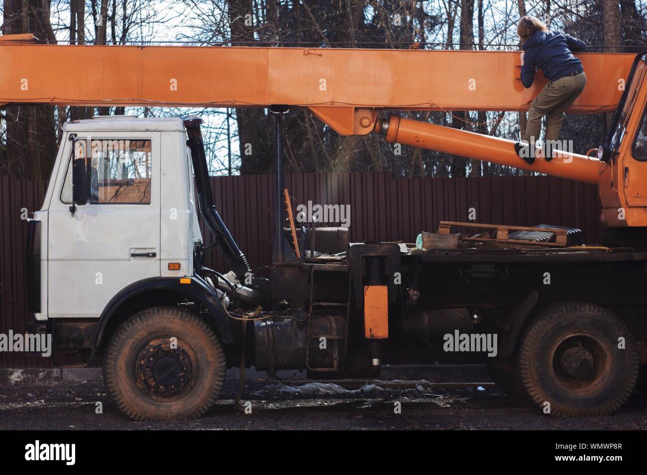 Man on crane hi-res stock photography and images - Alamy