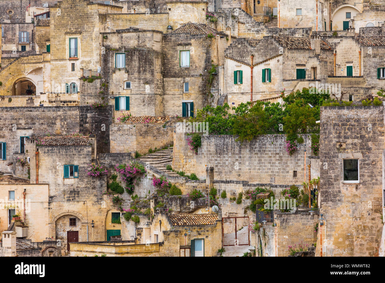 Italy, Basilicata, Province of Matera, Matera. Old stone buildings on a ...