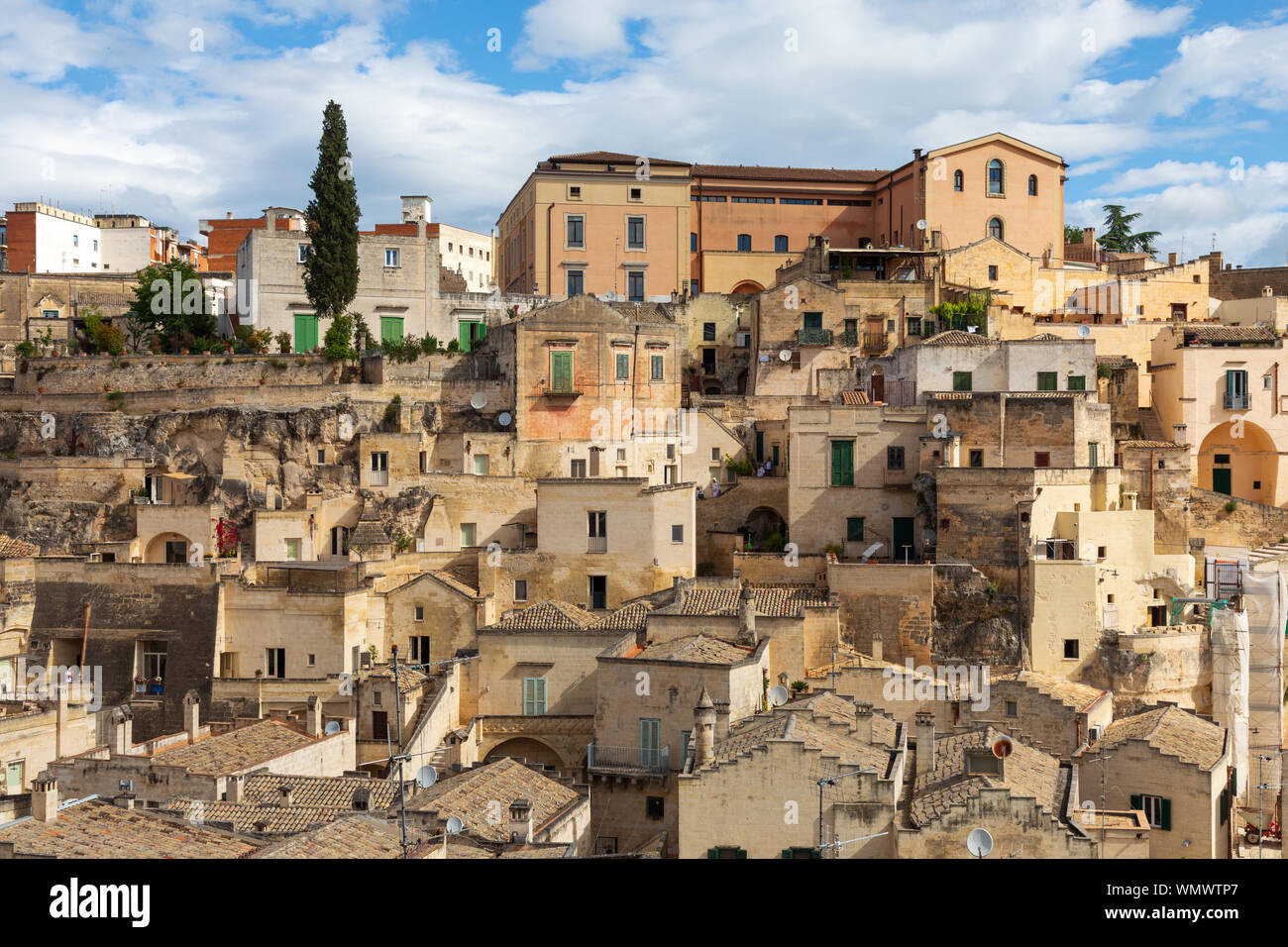 Italy, Basilicata, Province of Matera, Matera. Old stone buildings on a ...