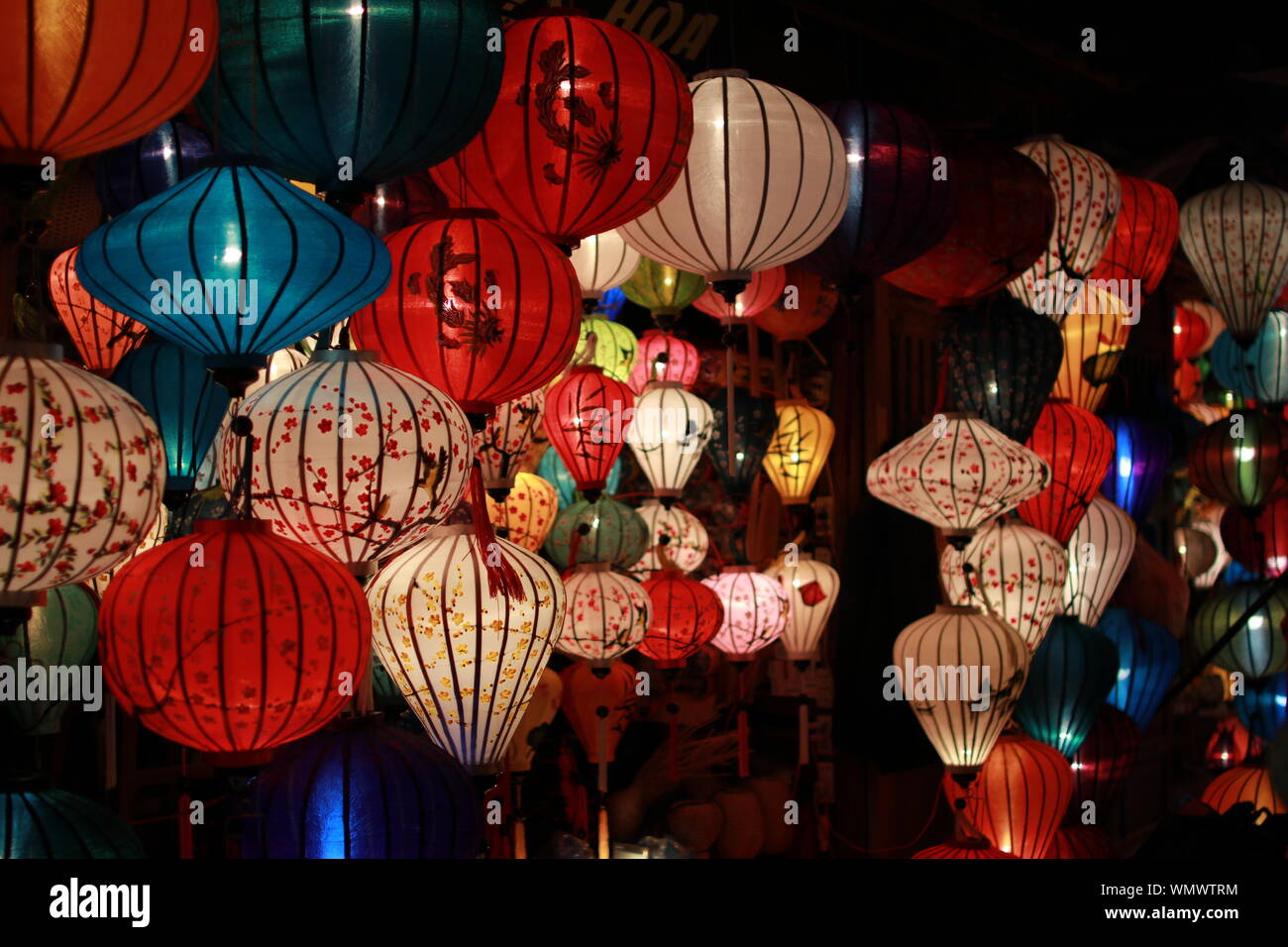 Multi Colored Lanterns Hanging For Sale At Market During Night Stock ...