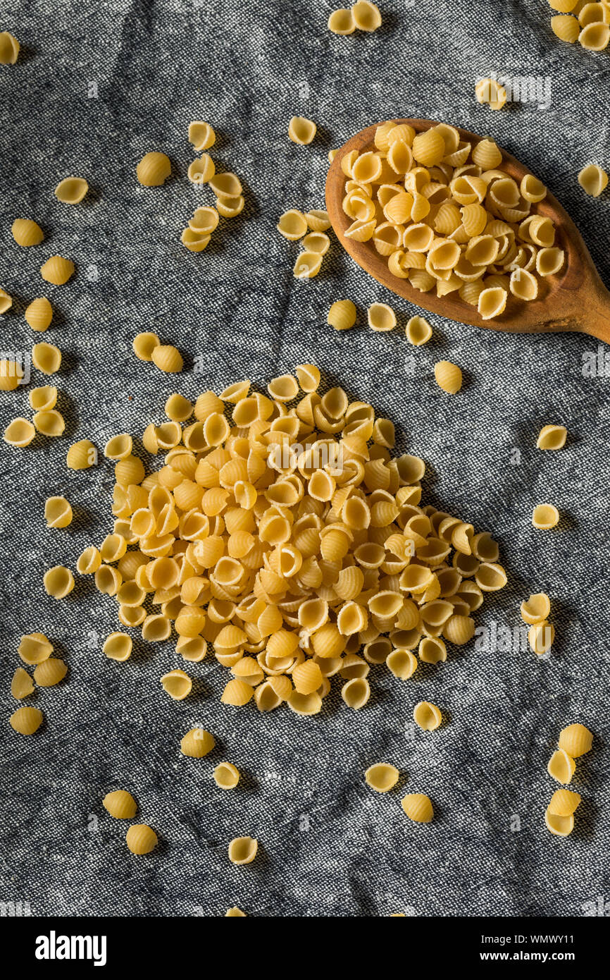 Dry Organic Macaroni Shells in a Pile Stock Photo - Alamy