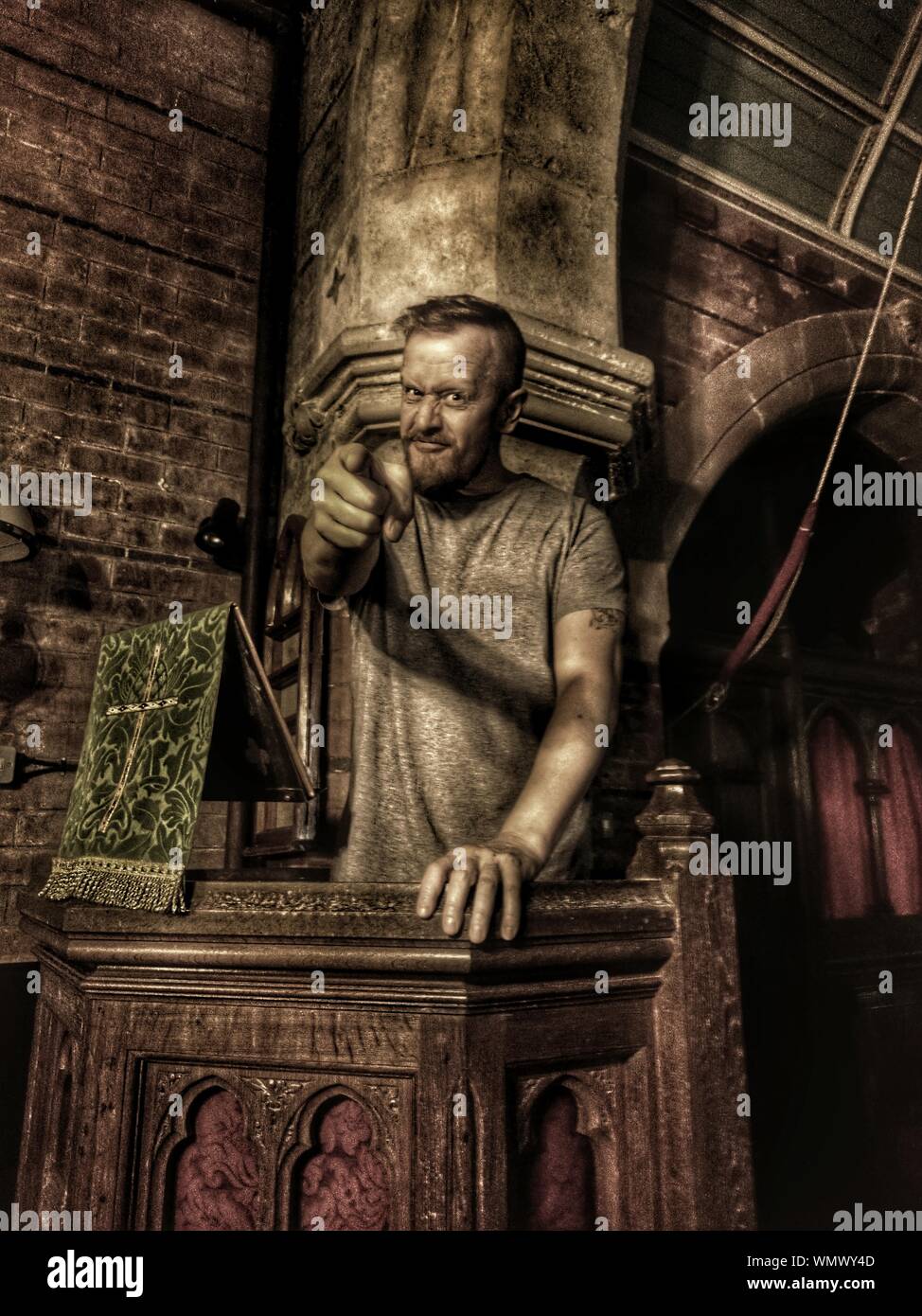 Man standing up in church hi-res stock photography and images - Alamy