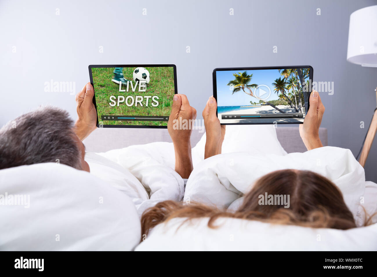 Movie in bed hi-res stock photography and images - Alamy