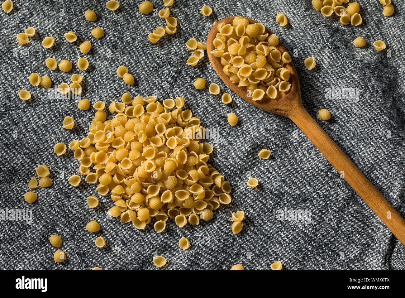 Dry Organic Macaroni Shells in a Pile Stock Photo - Alamy