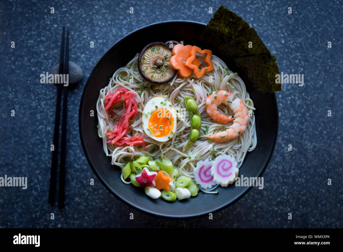 Bowl of Japanese buckwheat ramen noodle soup with colorful toppings ...