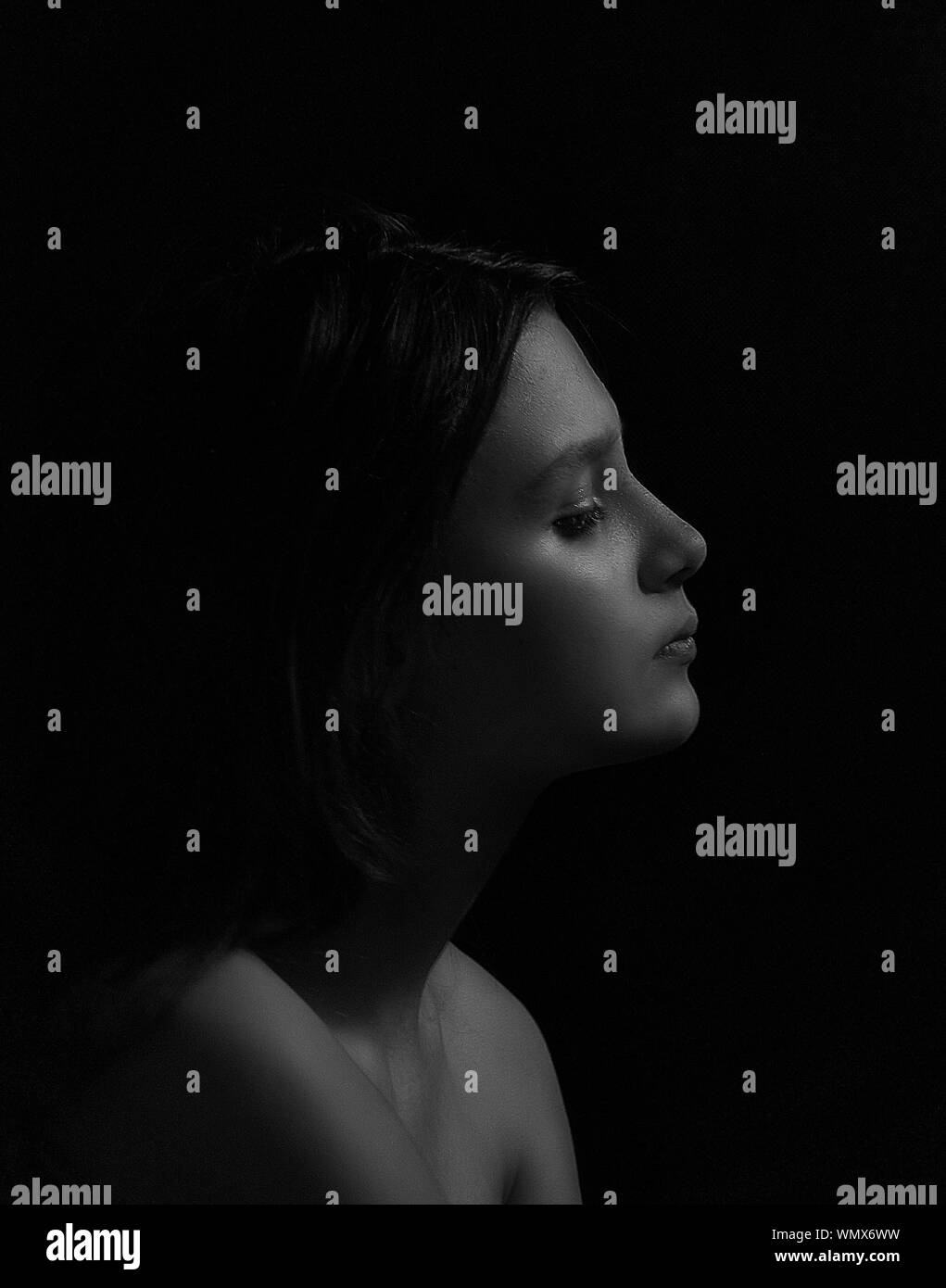 Low key woman Black and White Stock Photos & Images - Alamy