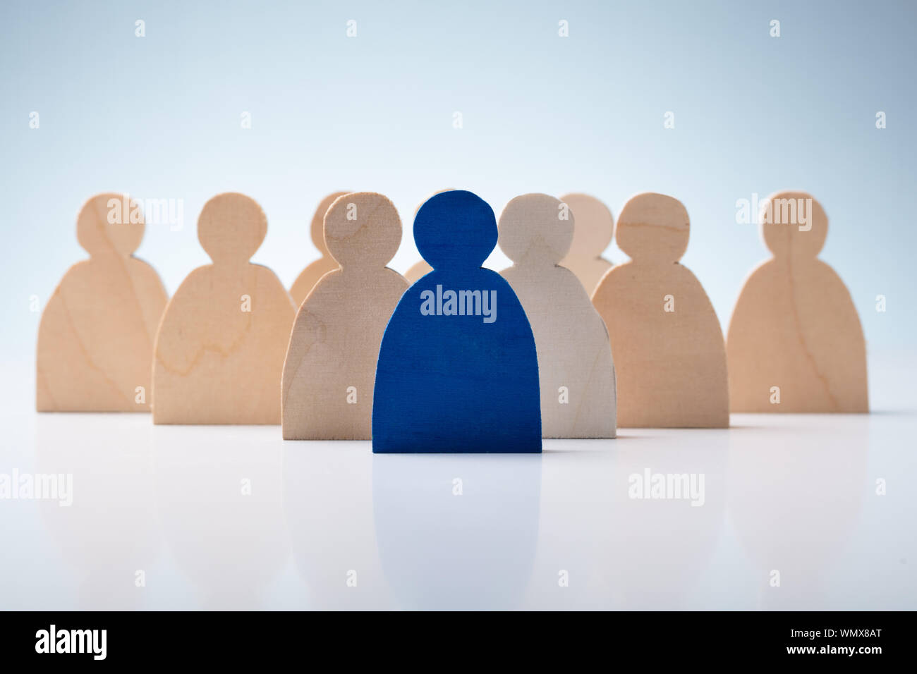 Group wooden people stand hi-res stock photography and images - Alamy