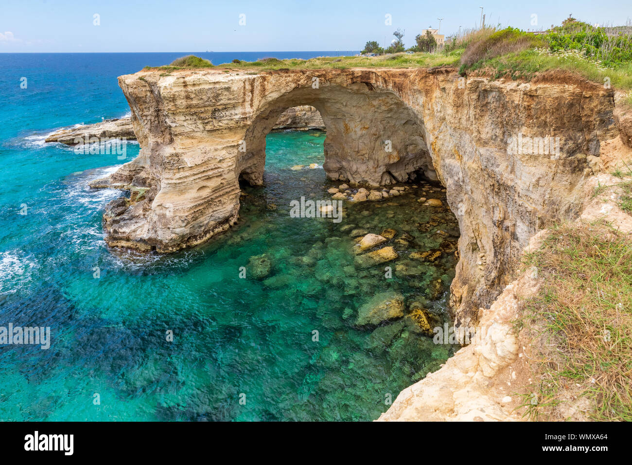 Italy, Apulia, Province of Lecce, Melendugno. The Faraglioni (limestone ...