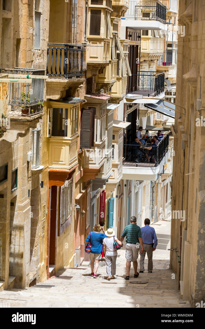 Malta, Valetta, old town, alley with houses and the typical clad ...