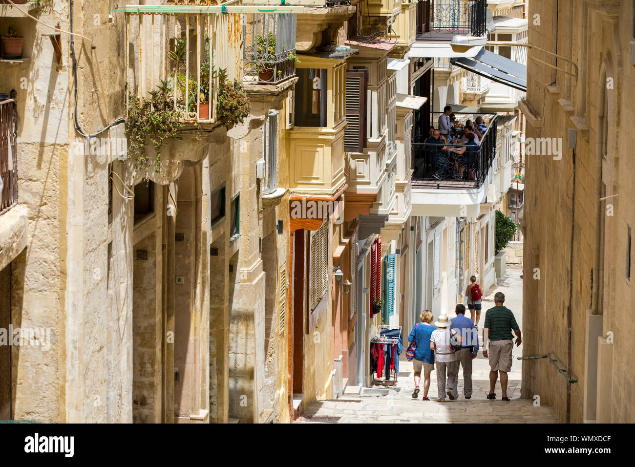 Malta, Valetta, old town, alley with houses and the typical clad ...