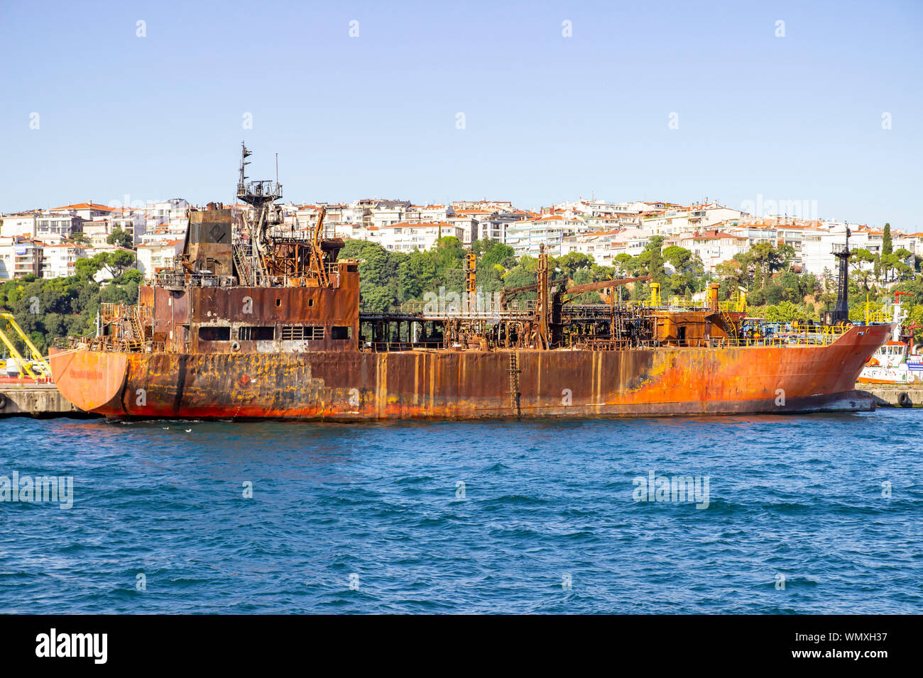 Old rusty oil tanker ship abandoned in a port in Istanbul. Ready to be ...