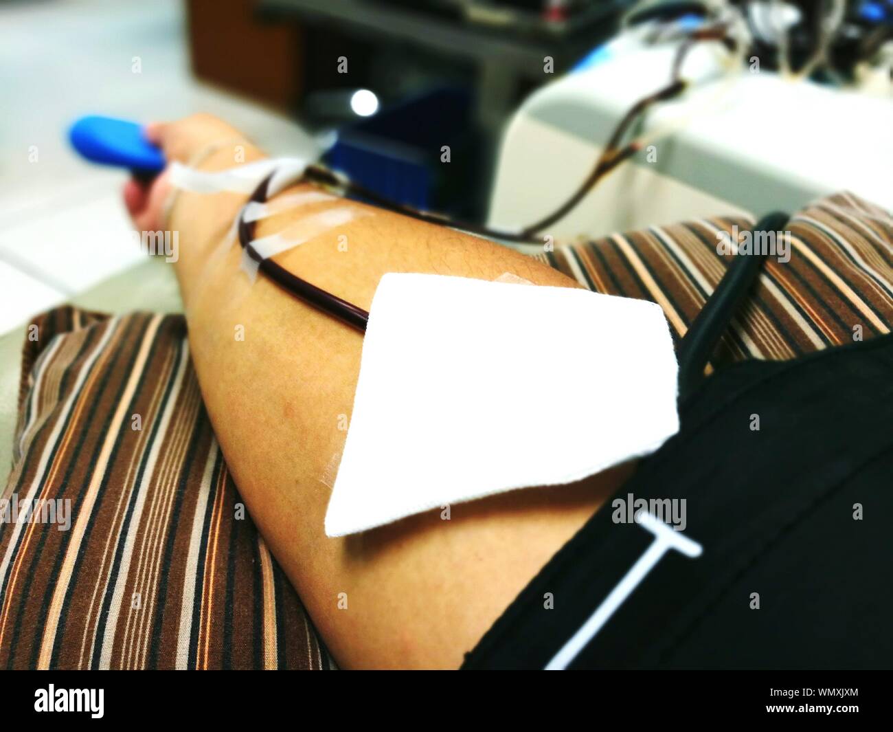 Human hand on iv drip hi-res stock photography and images - Alamy