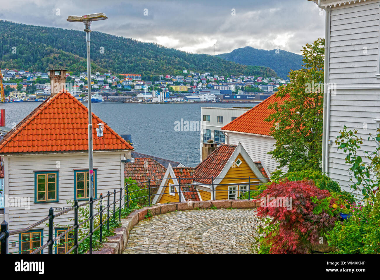 Timber houses in the neighbourhood of Nordnes and the shipping port ...