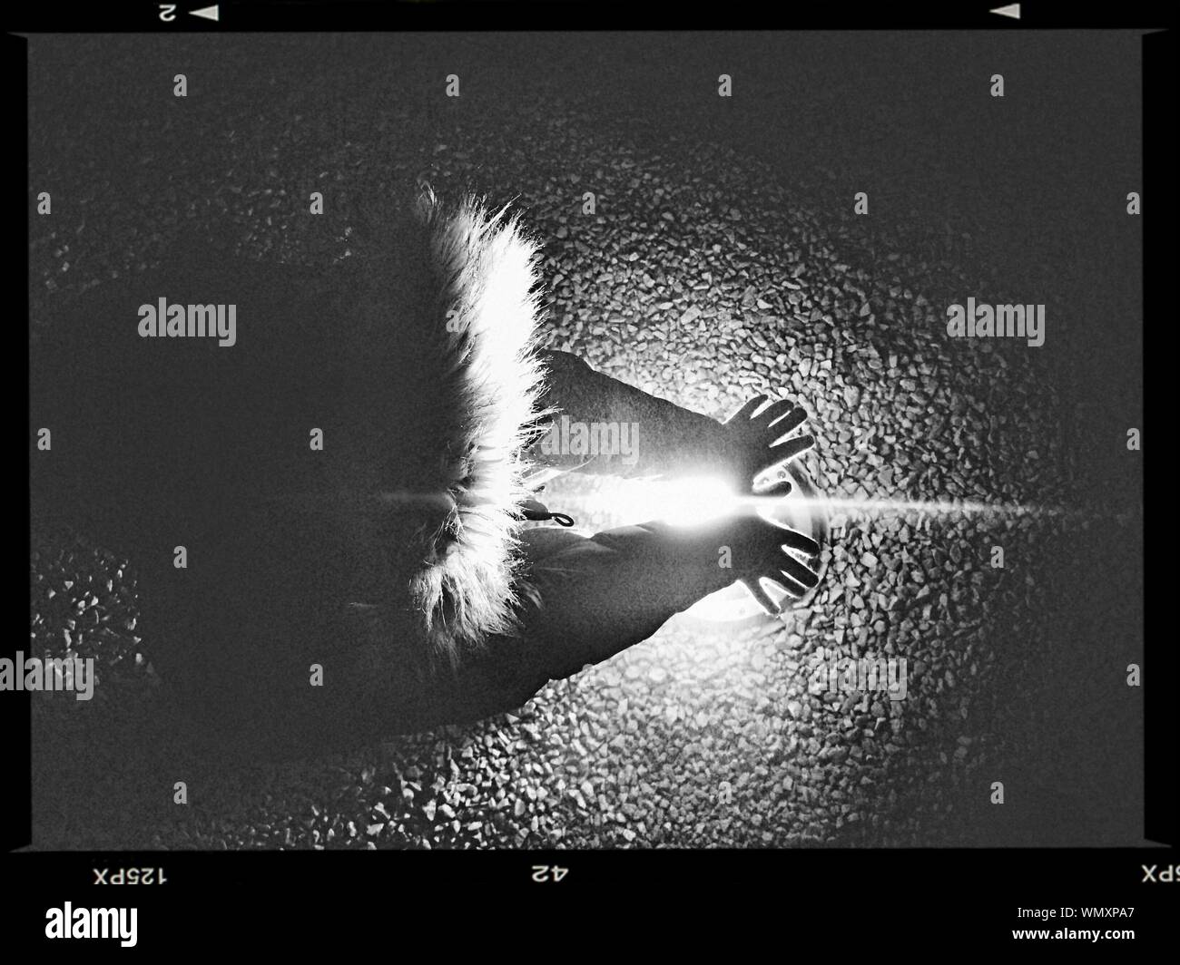 Warming hand over fire hi-res stock photography and images - Alamy