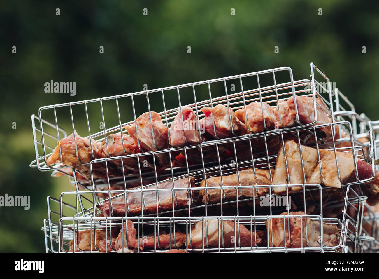 Side view of raw marinated meat for picnic Stock Photo - Alamy