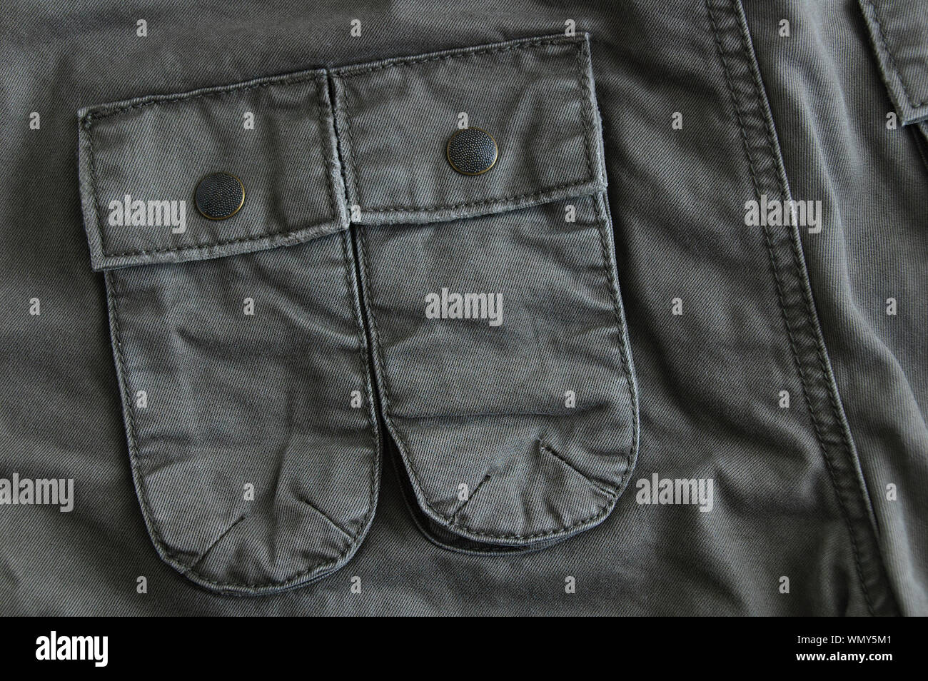 Close-up pockets of gray trousers. Work clothes Stock Photo - Alamy