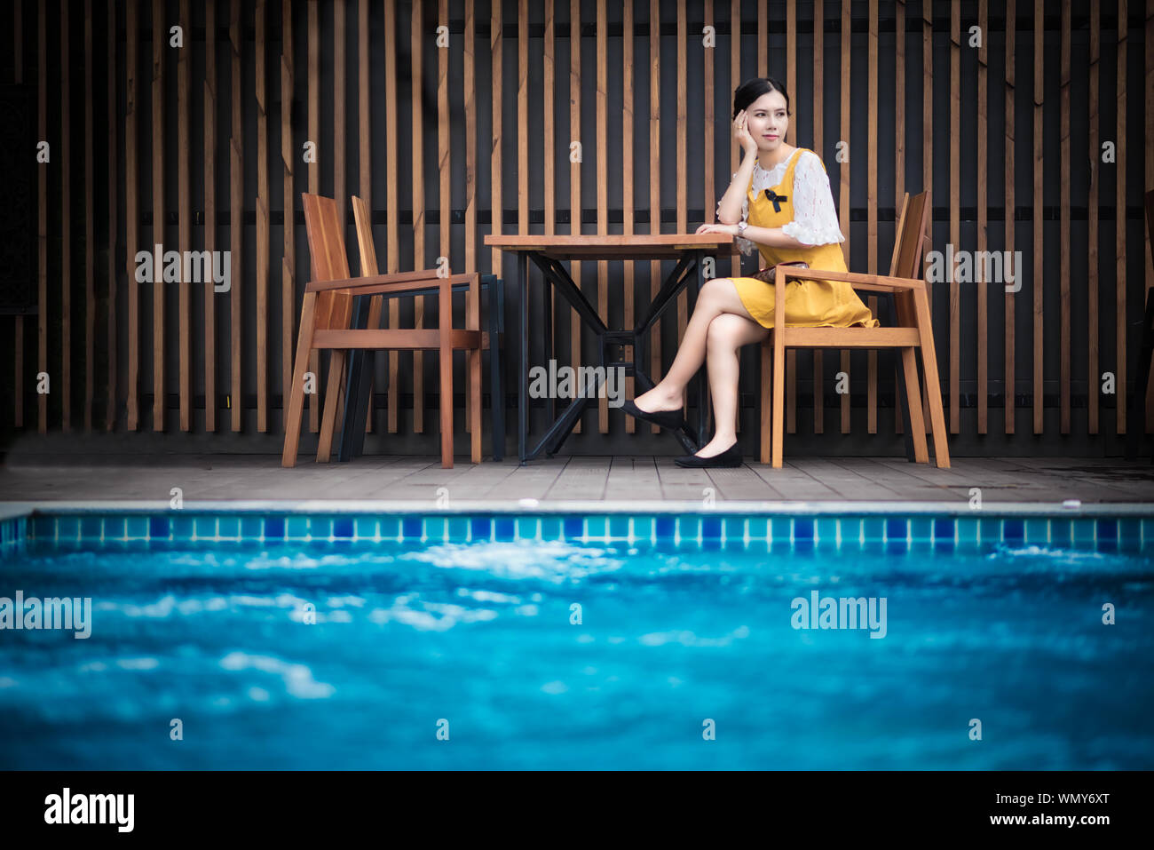 Pool woman chair hi-res stock photography and images - Alamy