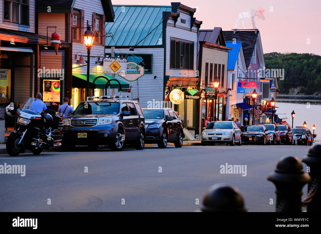 The main street of Bar Harbor towards harbor and waterfront during ...