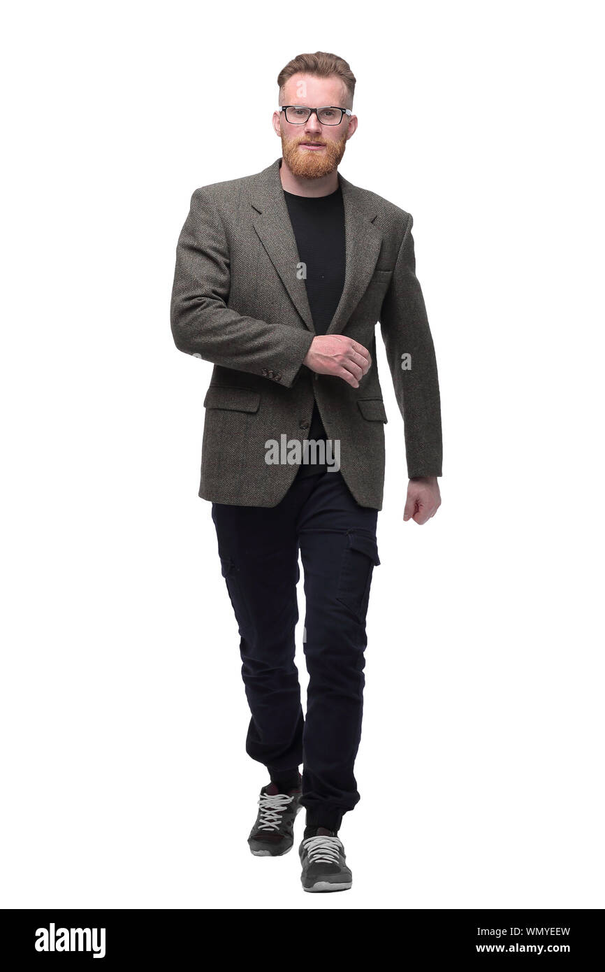 serious business man stepping forward . isolated on white background ...
