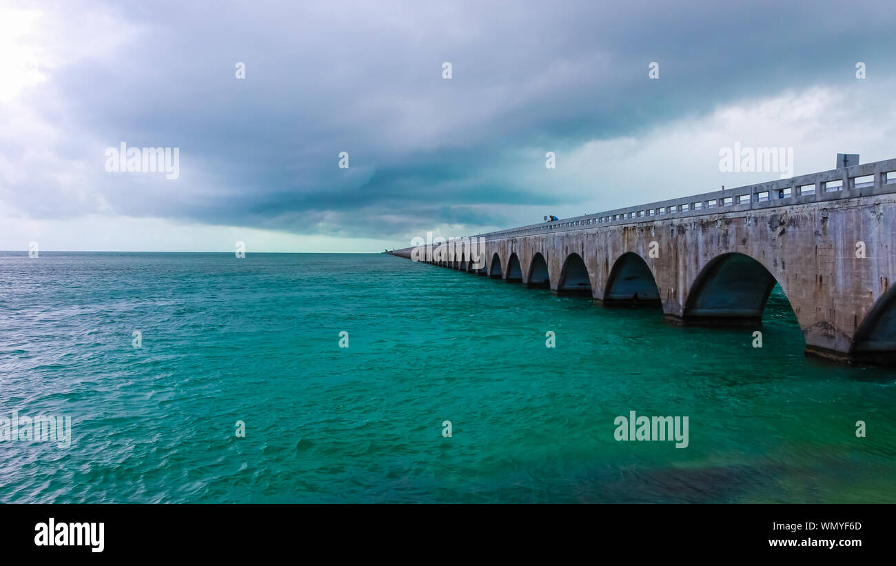Colour landscape photograph of bridge continueing into distance over ...
