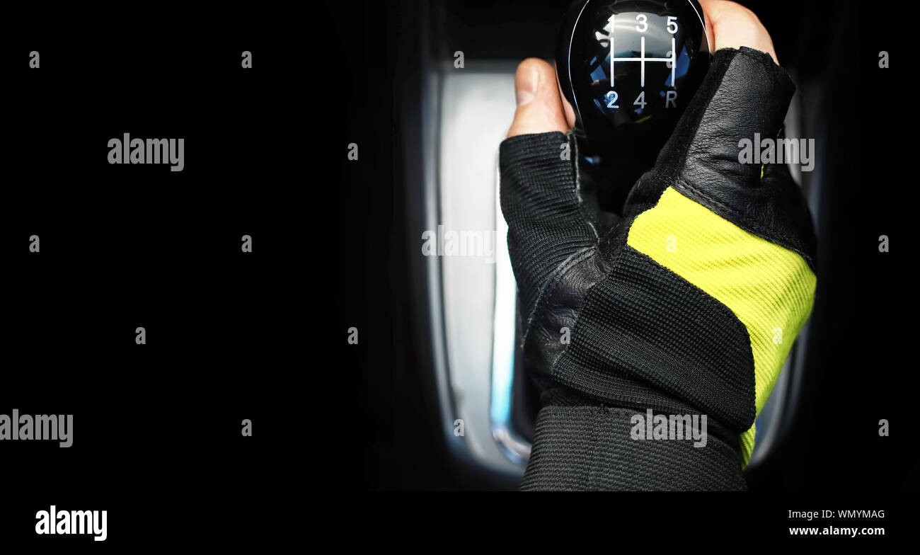 Gear lever. Manual Transmission. Hand on the gear shift in the car ...