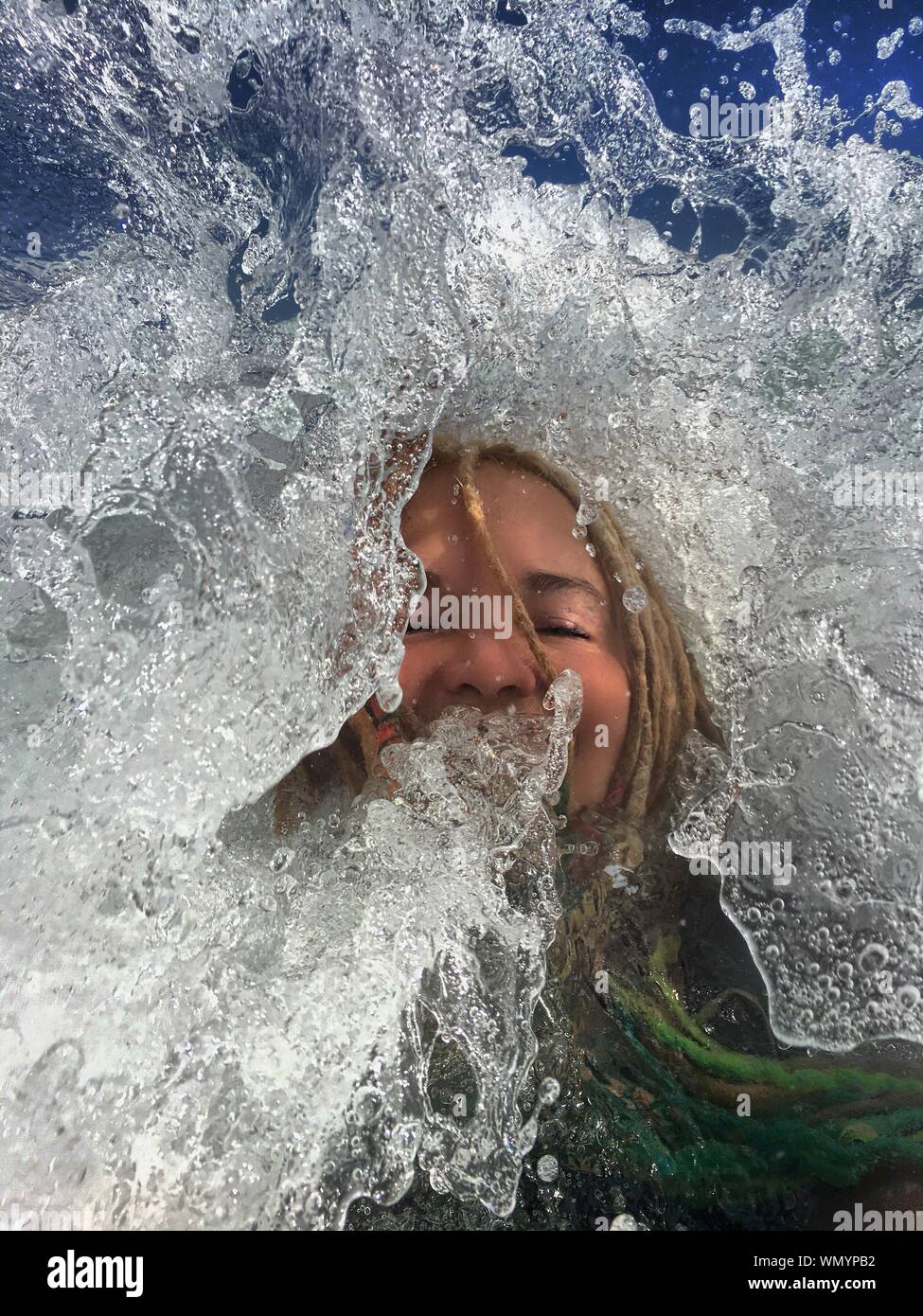 Woman swimming sea waves hi-res stock photography and images - Alamy