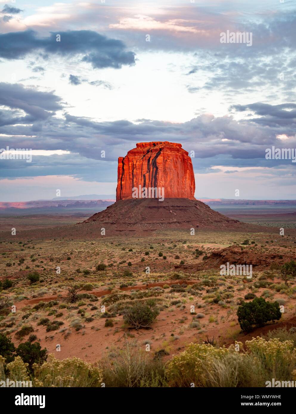 Table Mountain glows red at sunset, Merrick Butte, Navajo Tribal Park ...