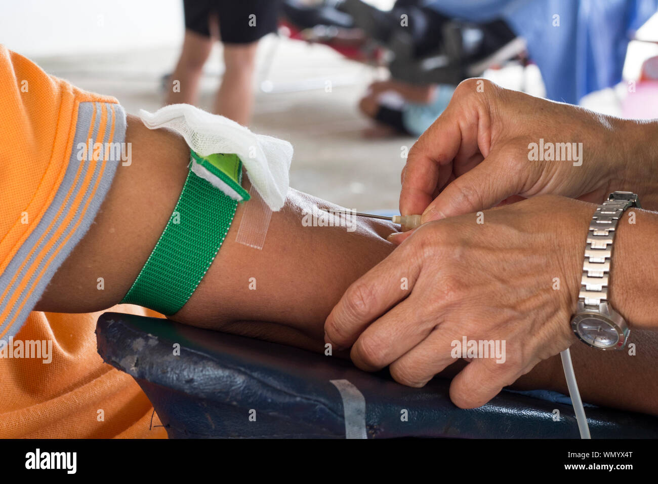 Syringe blood finger hi-res stock photography and images - Alamy