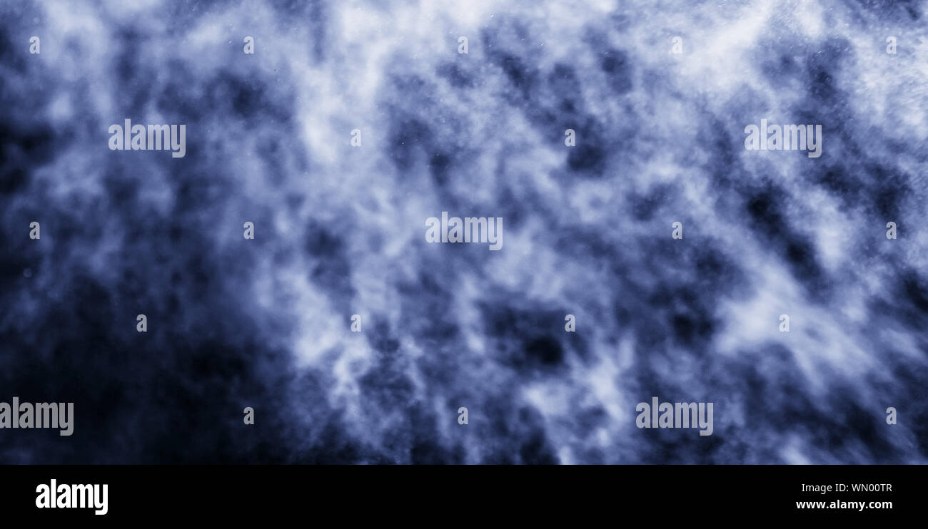 A stream of water and a cloud of drops Stock Photo - Alamy