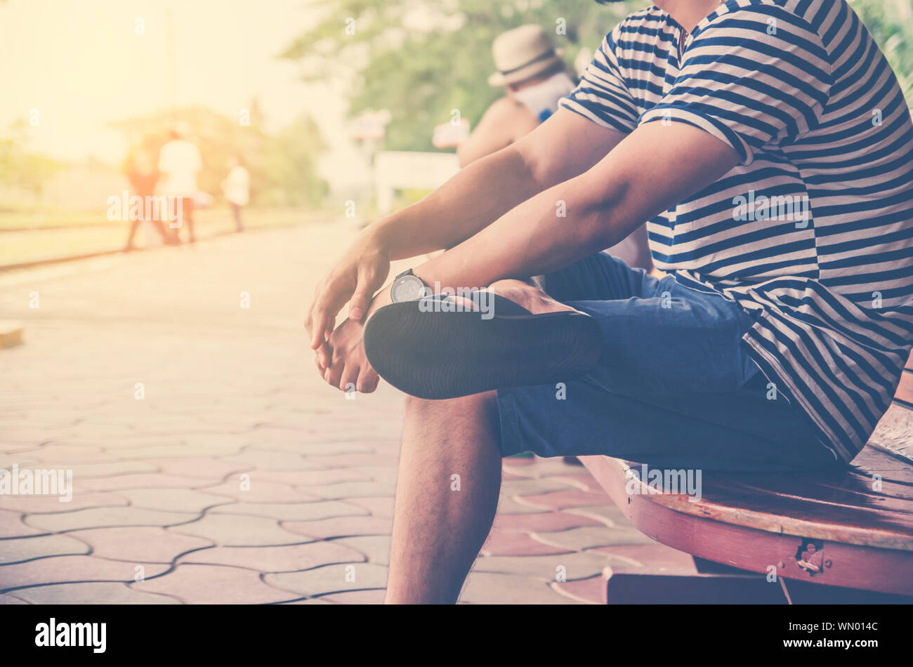 Legs on the bench hi-res stock photography and images - Alamy