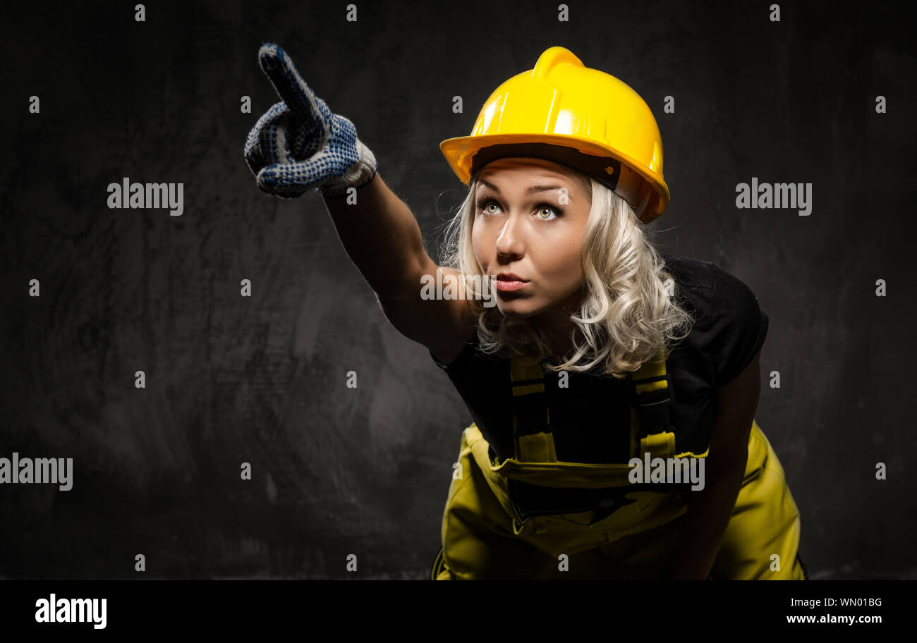 Construction worker pointing up hi-res stock photography and images - Alamy