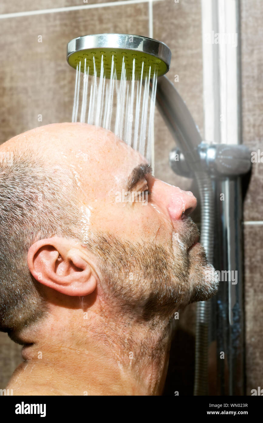Man in bathroom bald hi-res stock photography and images - Alamy