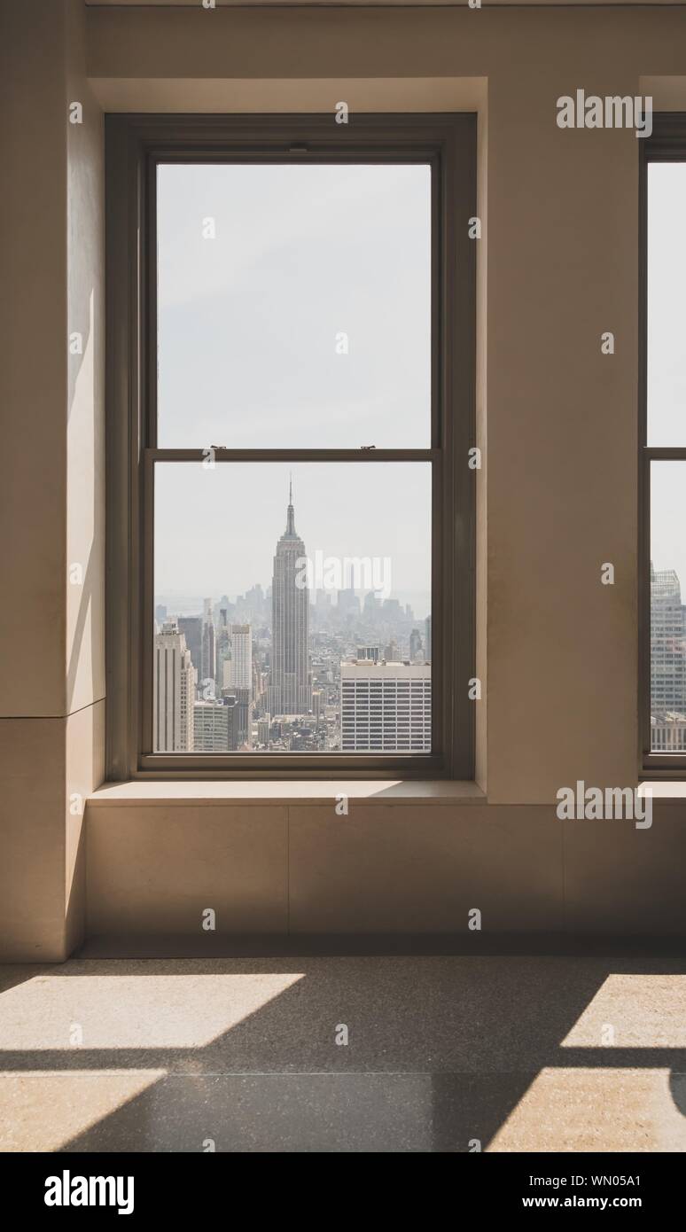 Empire State Building Seen From Window Stock Photo - Alamy